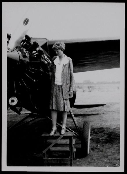 [Photograph of Amelia Earhart with Lockheed Martin Vega plane] | Gilder ...